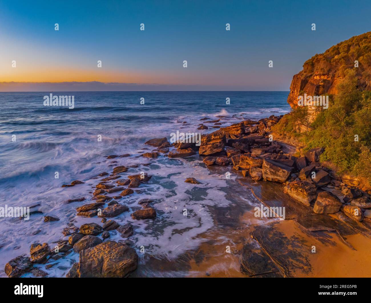 Aerial sunrise seascape with good size waves at Killcare Beach on the ...