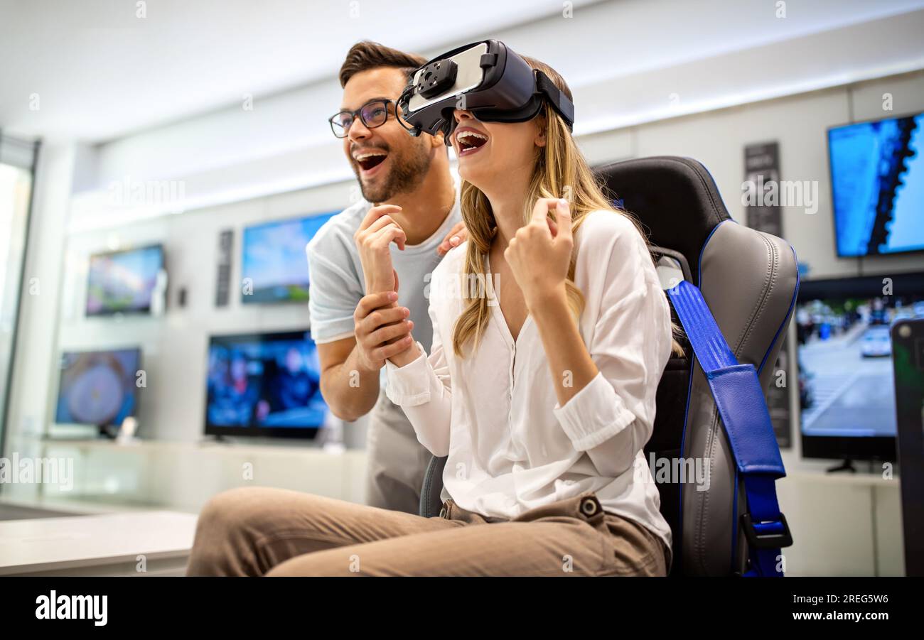 Young people using virtual reality headset. VR, future, gadgets ...