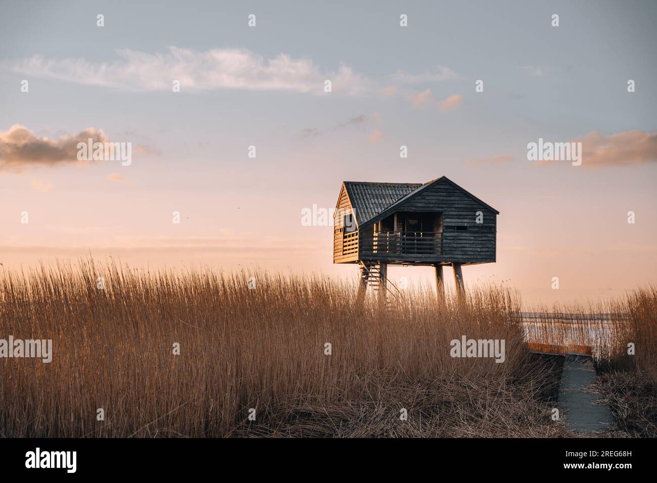 Sunset photo of Kiekkaaste Bird Observatory in The Netherlands at ...