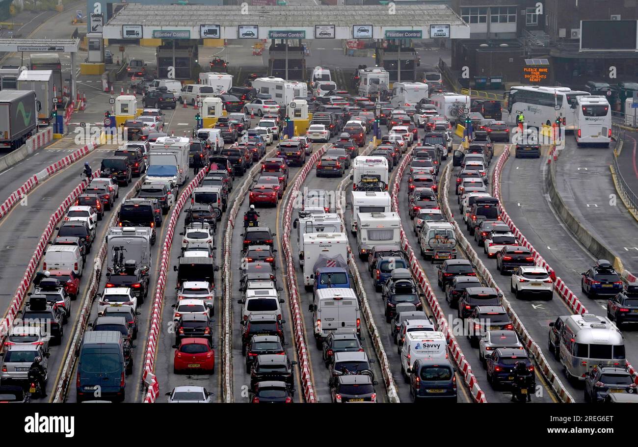 Cars queue at the Port of Dover, Kent, as the busy summer travel period ...