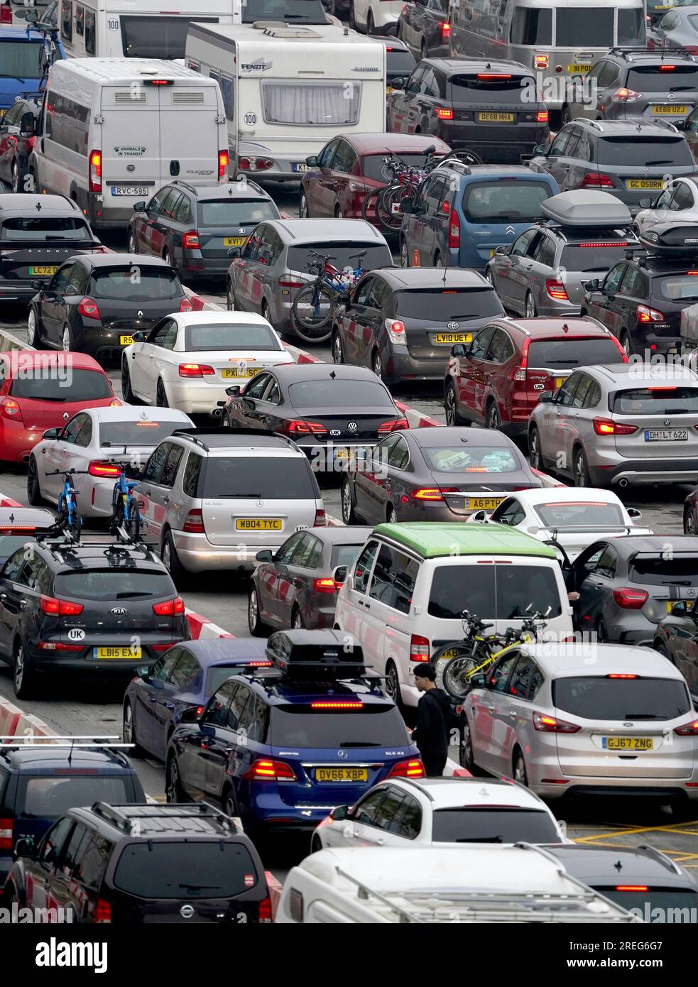Cars queue at the Port of Dover, Kent, as the busy summer travel period ...