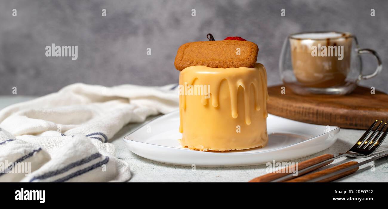 Caramel and biscuit cake. Patisserie products. Liquid caramel cake on a ...