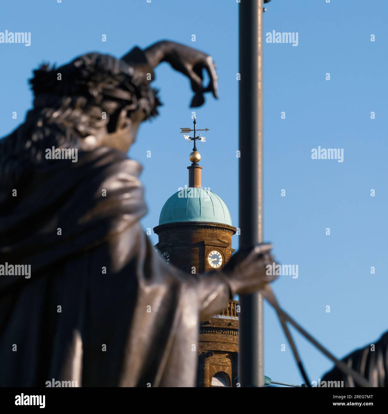 View of St. Mary's Church dome and steeple through the arms of the The ...