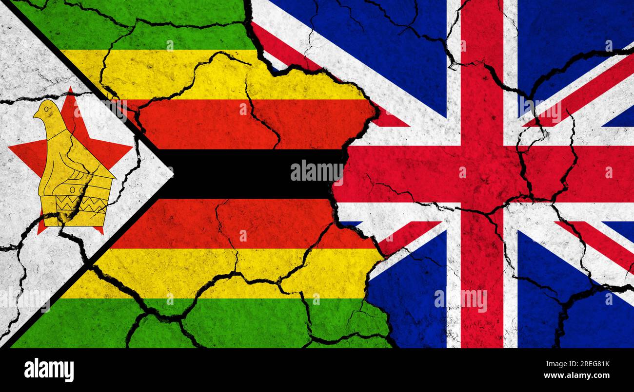 Flags of Zimbabwe and United Kingdom on cracked surface - politics ...