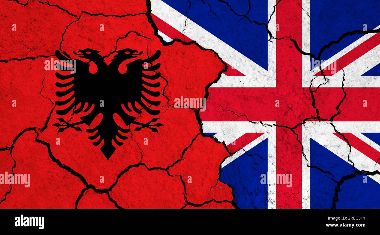 Flags of Albania and United Kingdom on cracked surface - politics ...