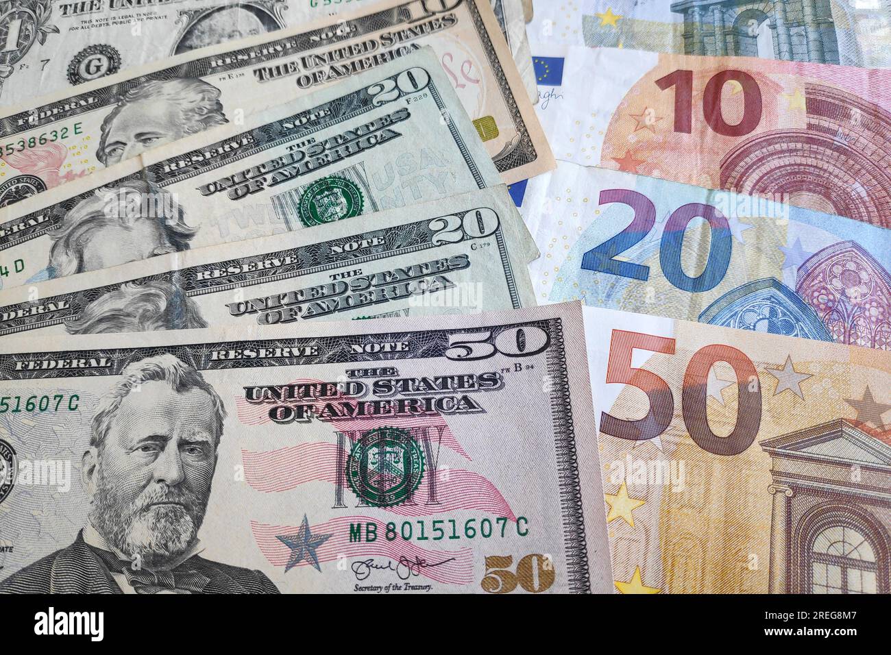 Close-up on a stack of US Dollar and Euros Stock Photo - Alamy