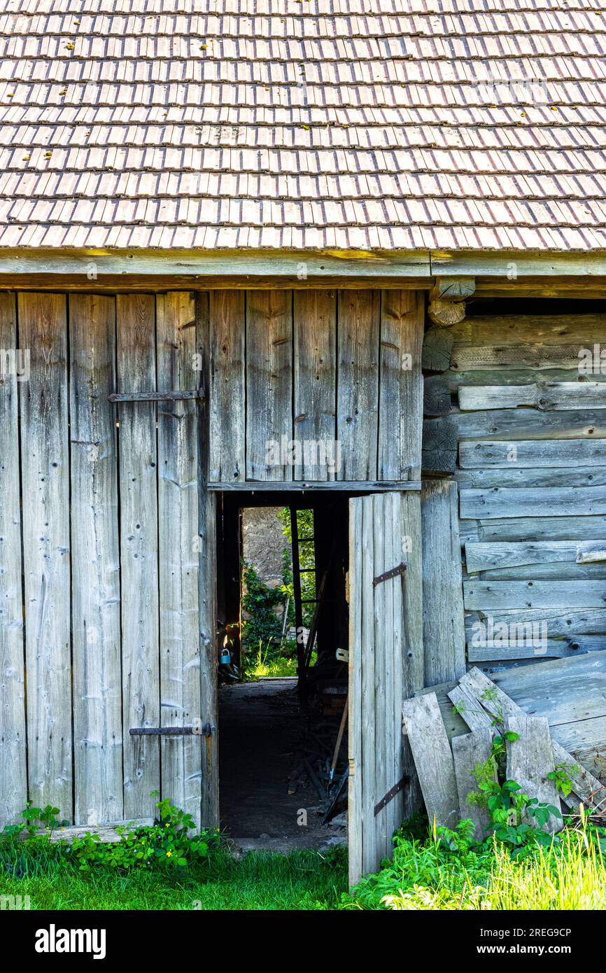 Open door on an old unused wooden barn Stock Photo - Alamy