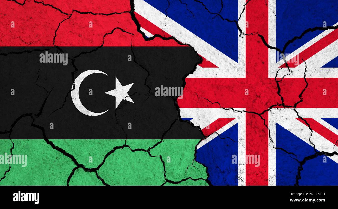 Flags of Libya and United Kingdom on cracked surface - politics ...