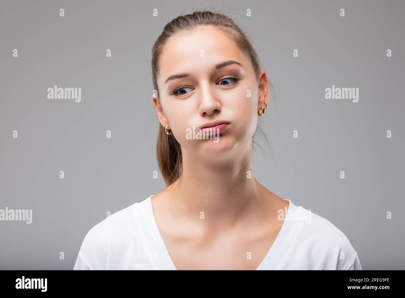 Portrait of an exasperated woman, her facial expression perfectly ...