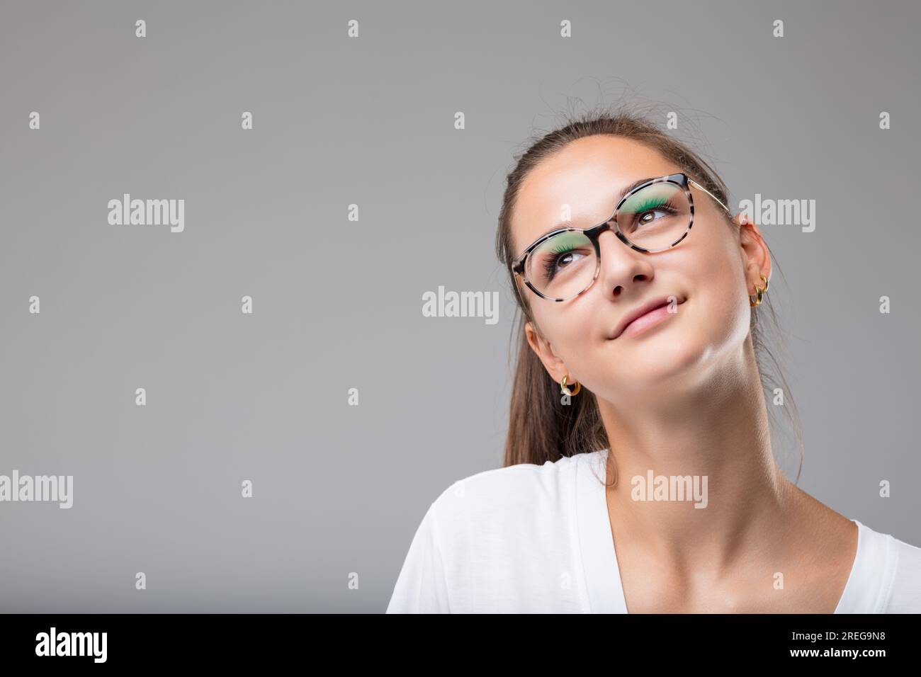 Her face is a canvas of intense thought, hinting at a desire for ...