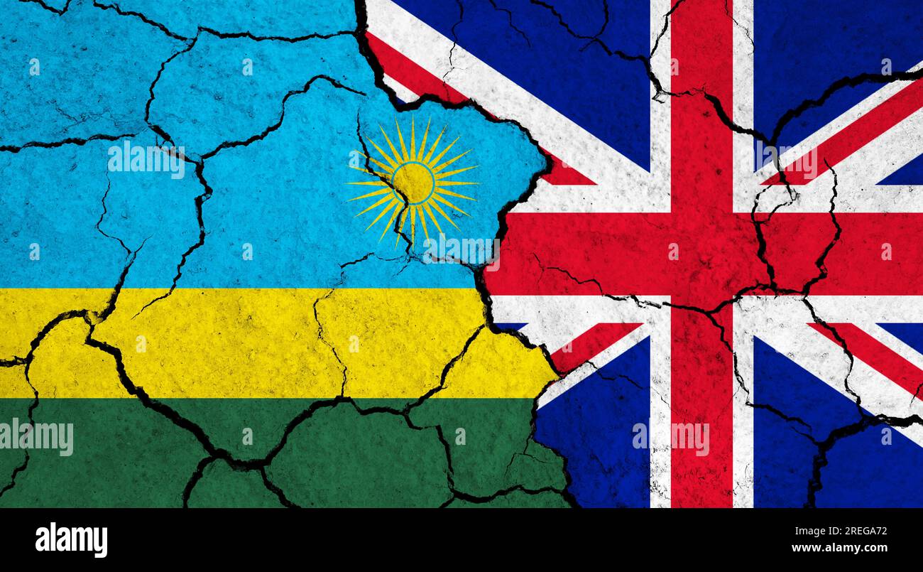 Flags of Rwanda and United Kingdom on cracked surface - politics ...