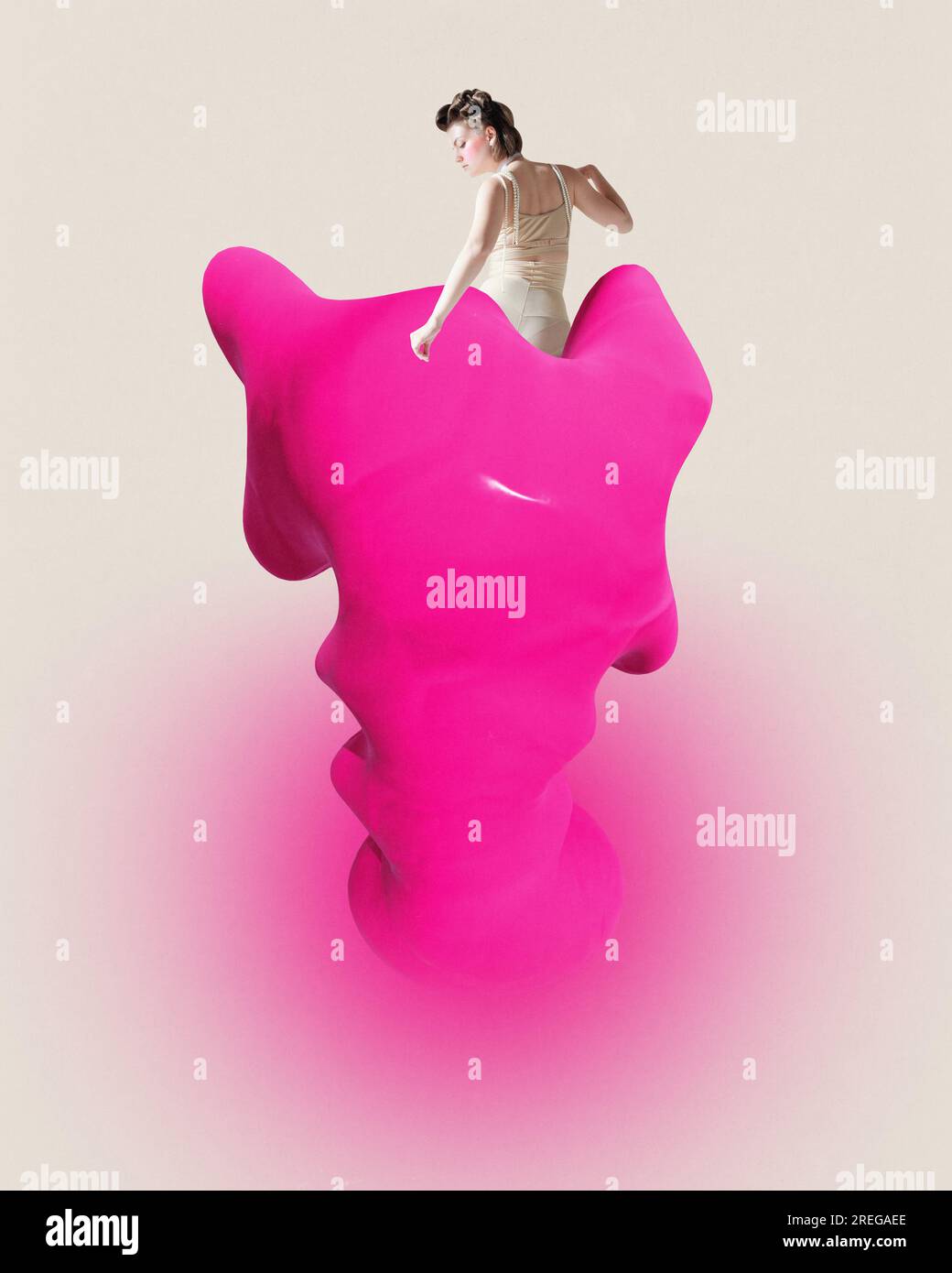 Image of young lady sit down on 3d neon pink shapeless figure over ...