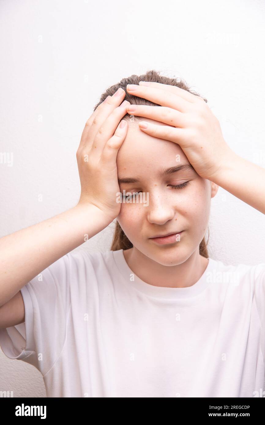 teen girl suffering, girl covered head with hands, worry about problems ...