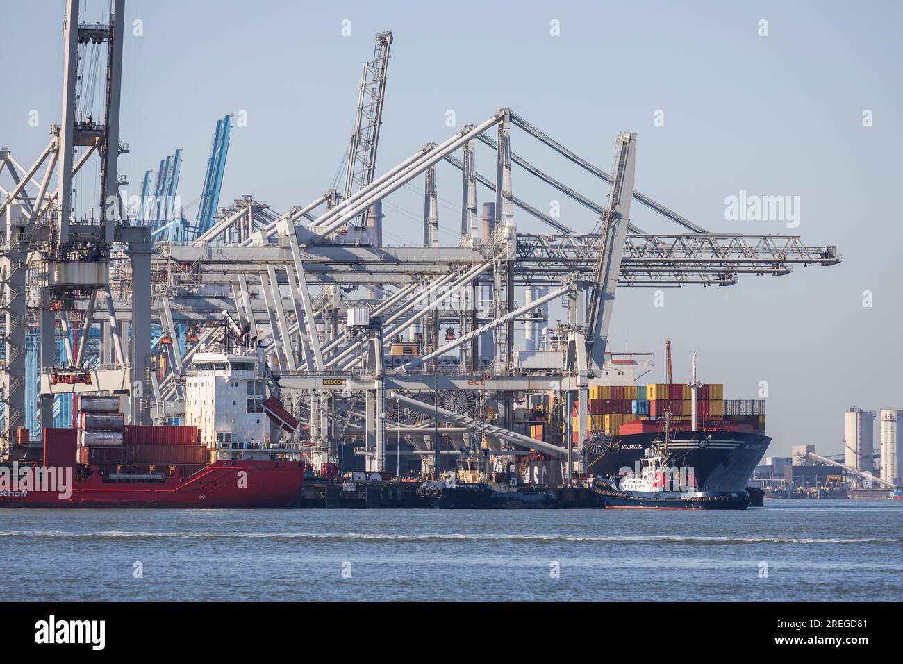 Rotterdam, the Netherlands - 2022-02-26: Ships loading goods at ECT ...