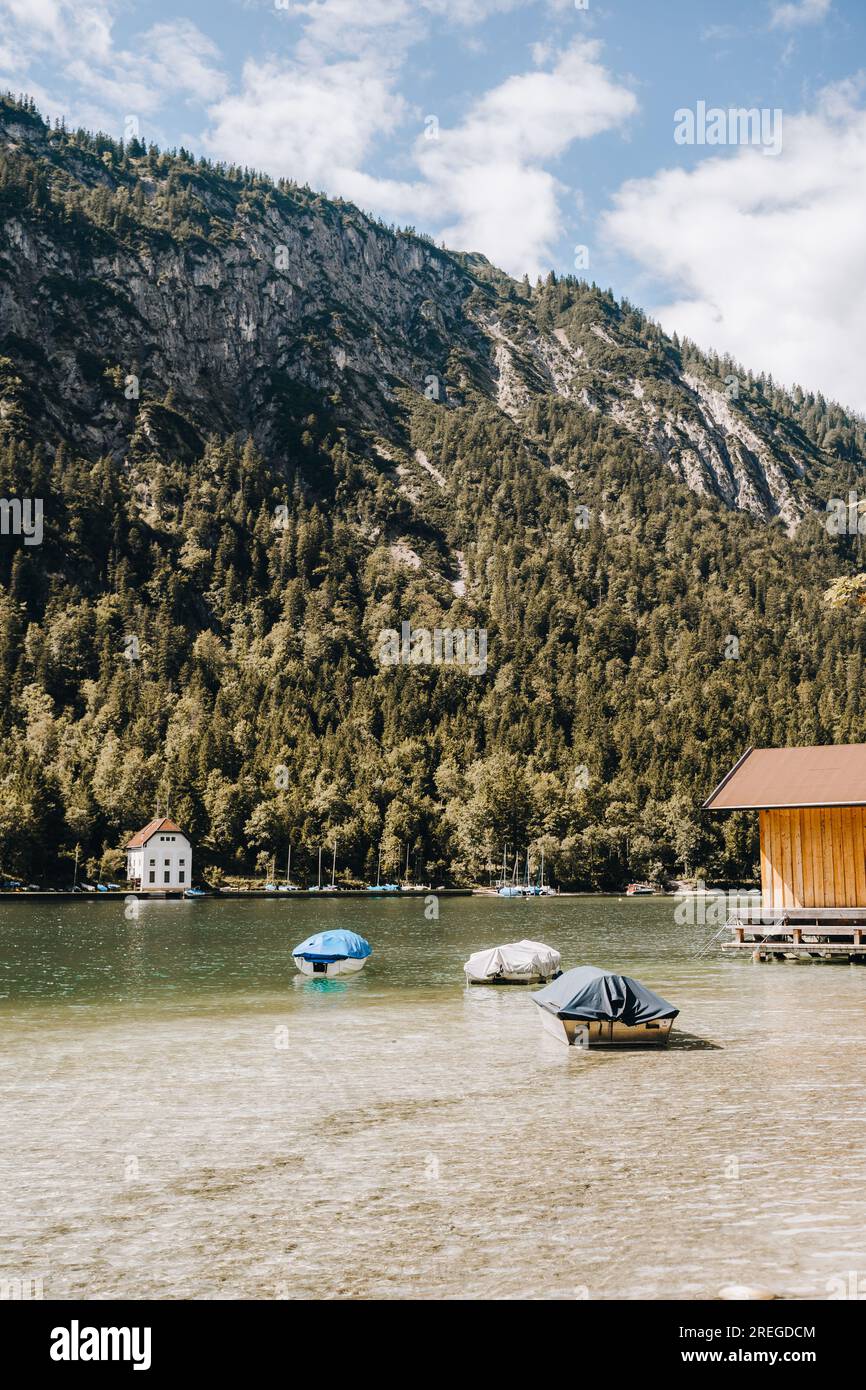 Boats at Lake Plansee, mountain lake in Austria close to Germany ...