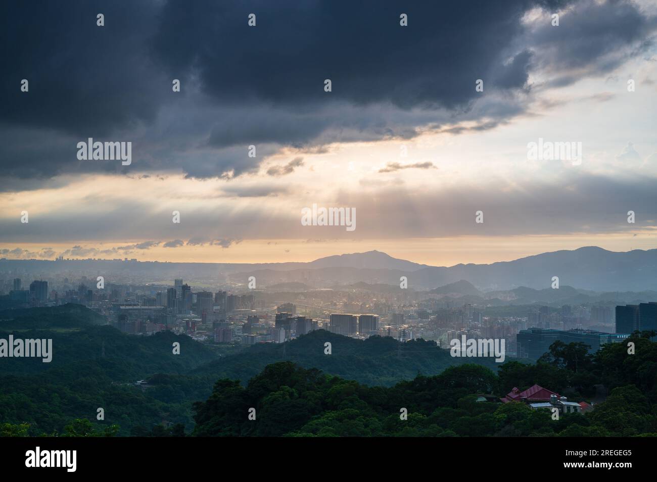 Dynamic Crepuscular Ray and silhouette of Guanyin Mountain. View of the ...
