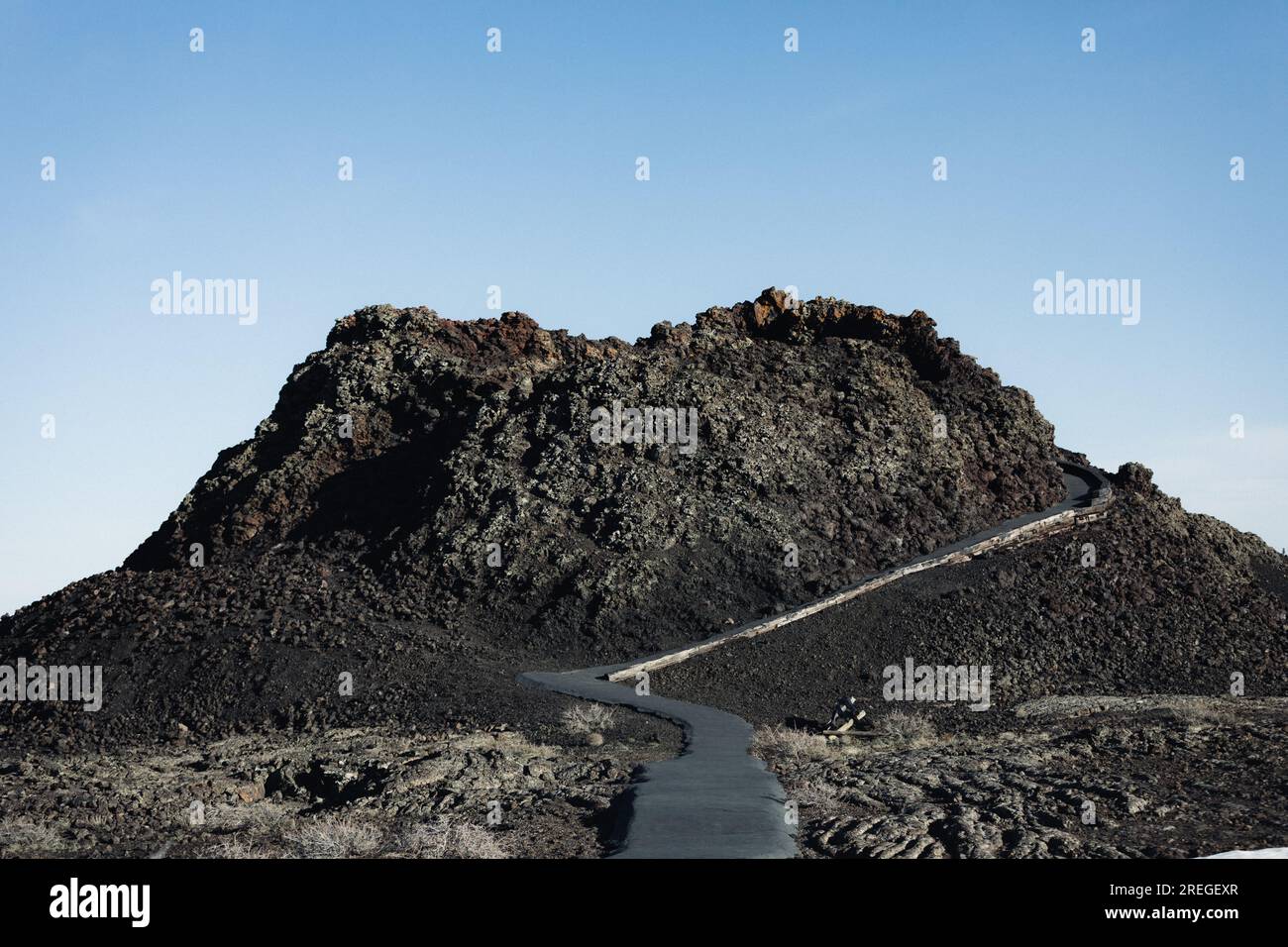 volcanic cone with paved path at craters of the moon national monument ...