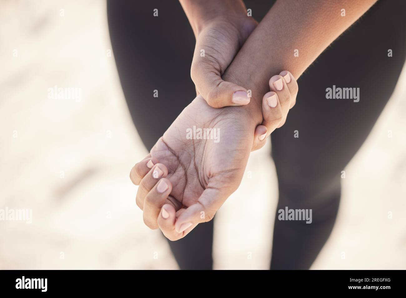 Sports, closeup and woman with a wrist injury, accident or sprain ...