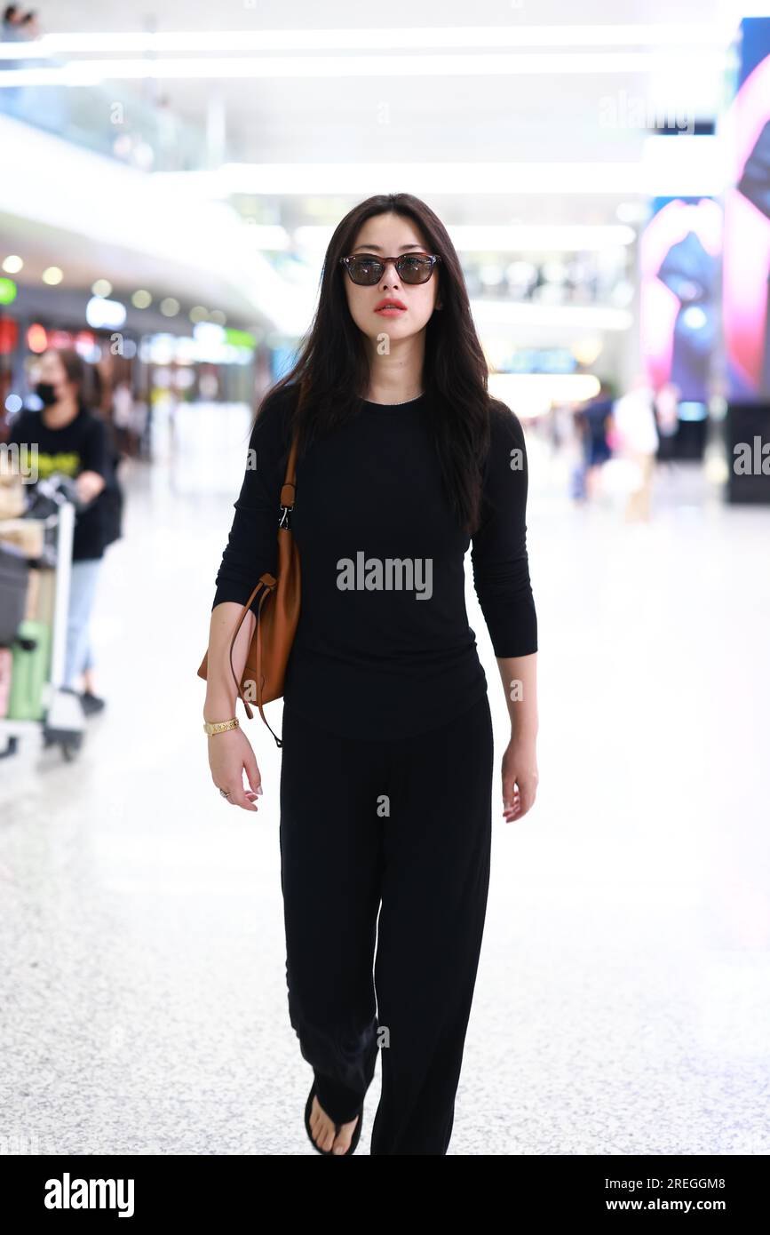 Chinese actress and singer Zhu Zhu appears at airport in Shanghai ...