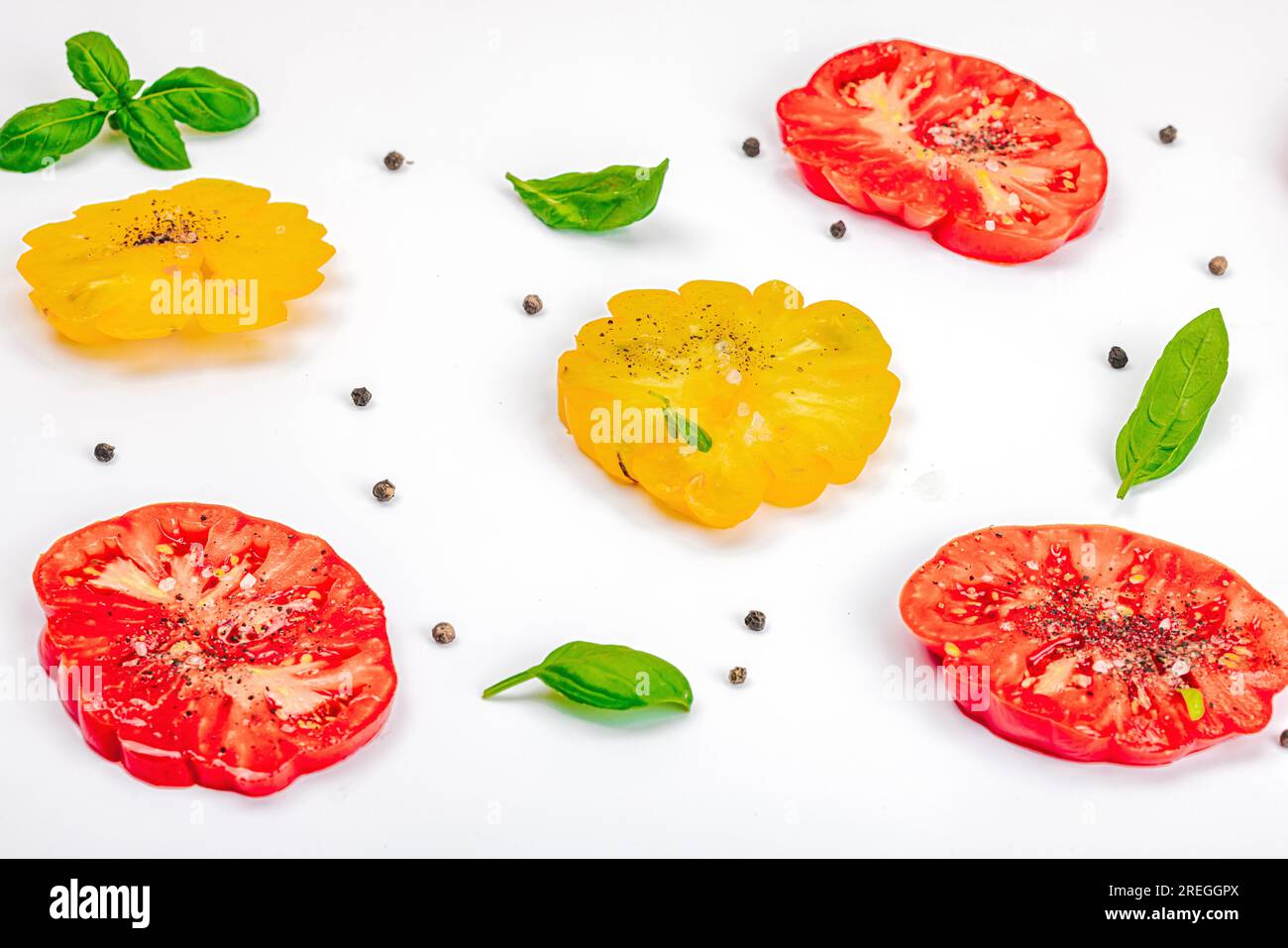 Colorful Heirloom tomato harvest isolated on white background. Ripe ...