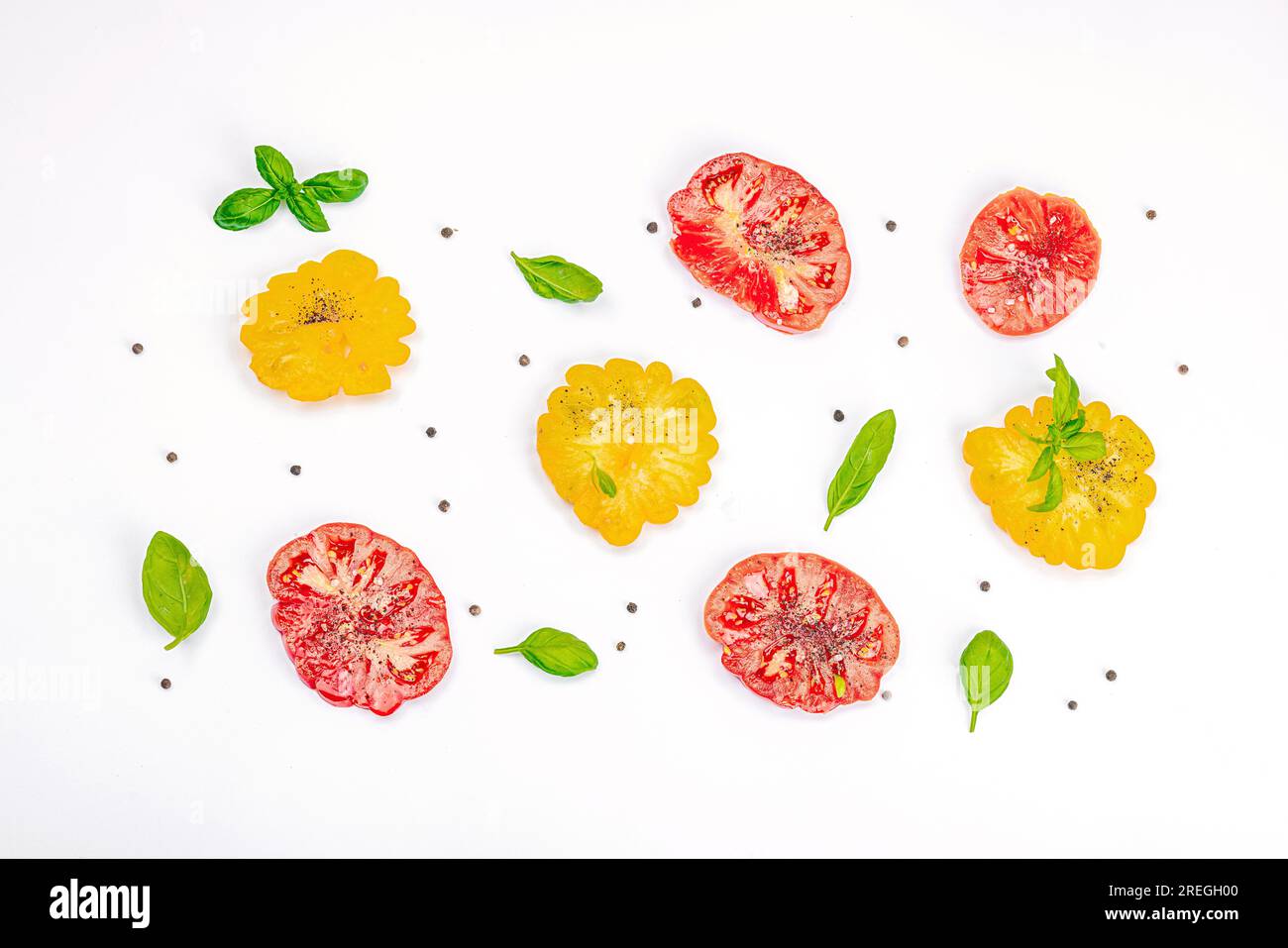 Colorful Heirloom tomato harvest isolated on white background. Ripe ...