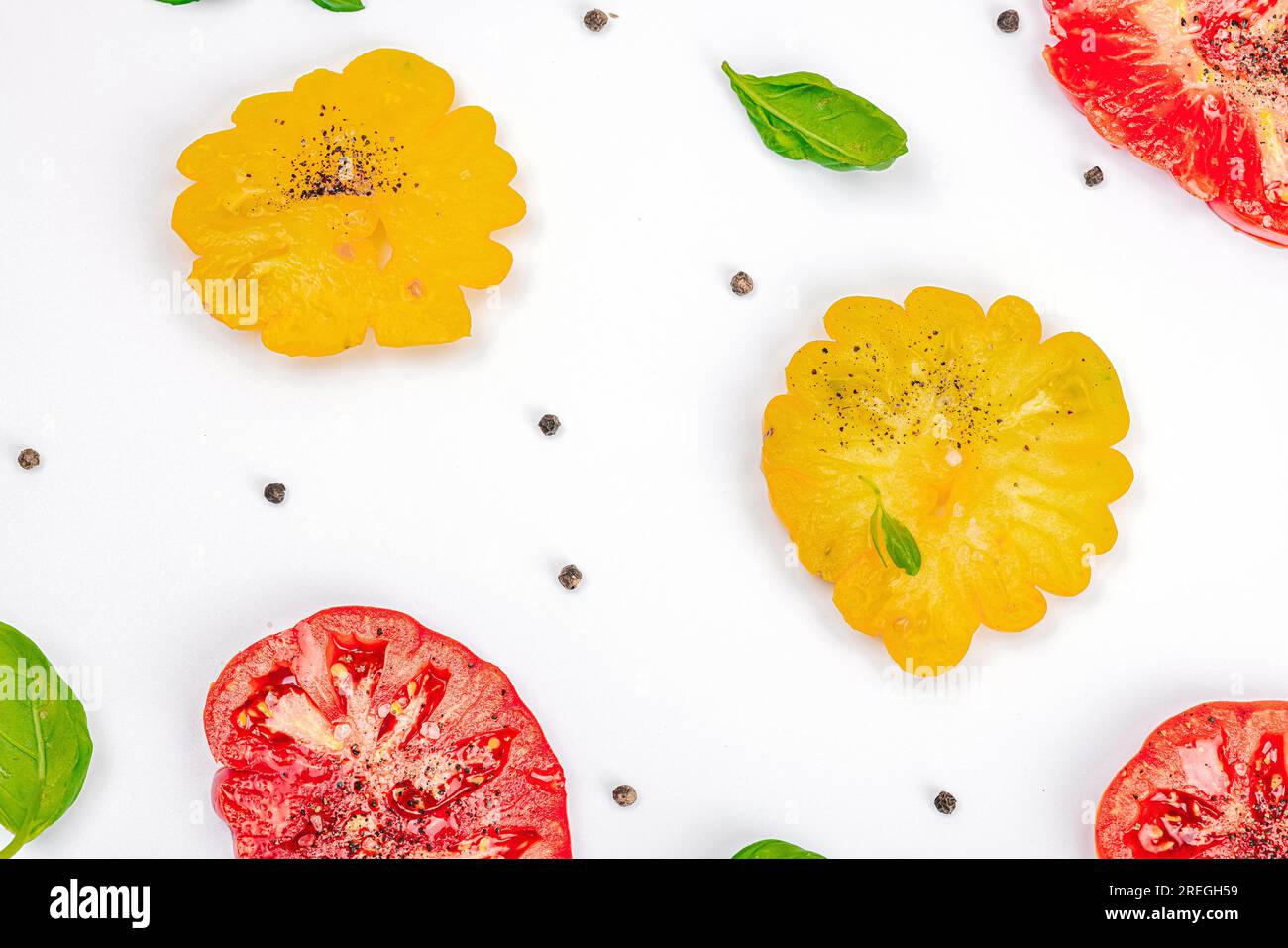 Colorful Heirloom tomato harvest isolated on white background. Ripe ...