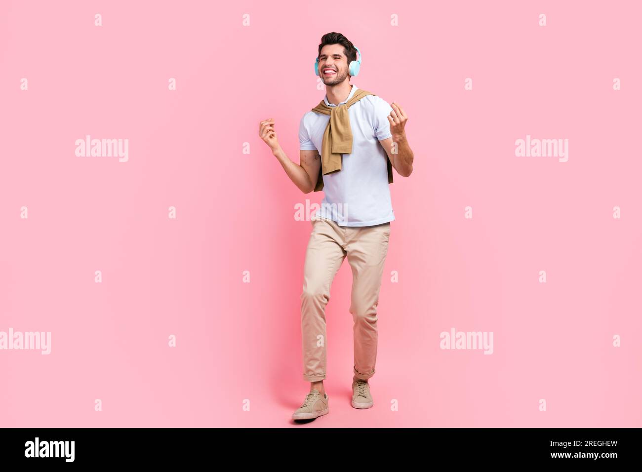 Full body photo of young carefree man wear white polo t-shirt fingers ...