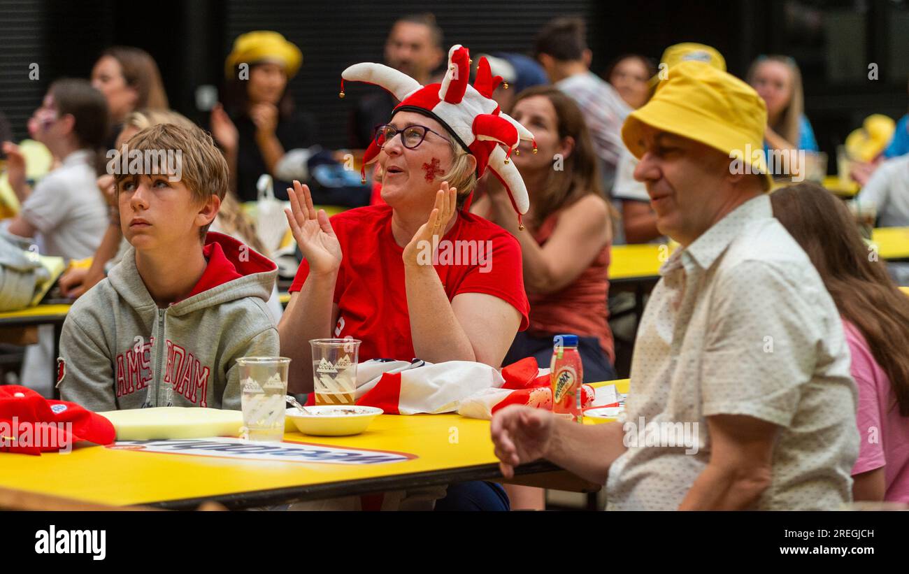 London, UK. 28 July 2023. Fans at BOXPARK in Wembley Park watch the ...