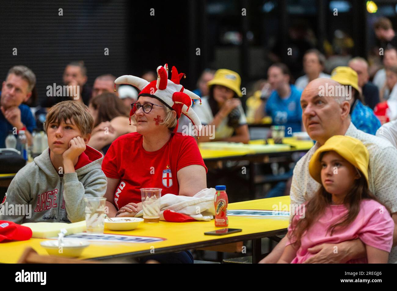 London, UK. 28 July 2023. Fans at BOXPARK in Wembley Park watch the ...