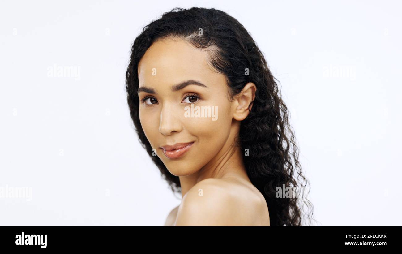 Black woman, over shoulder face and beauty with smirk and sensual flirt ...