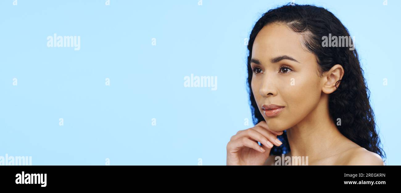 Skincare, woman and thinking face in studio for beauty, dermatology and ...