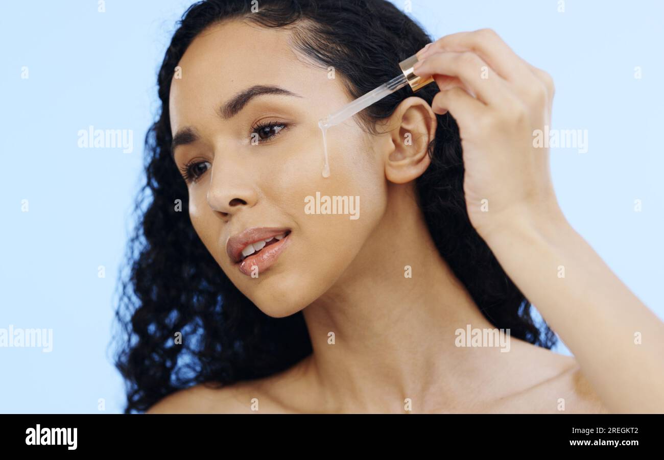 Woman, beauty and oil dropper for face makeup, healthy aesthetic and ...