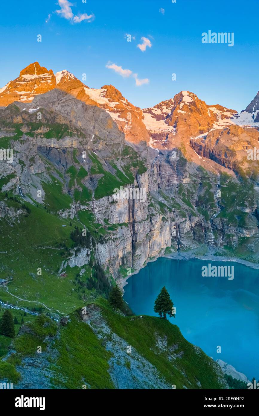 Aerial view of the sunset on the Oeschinensee. Kandersteg, Bernese ...
