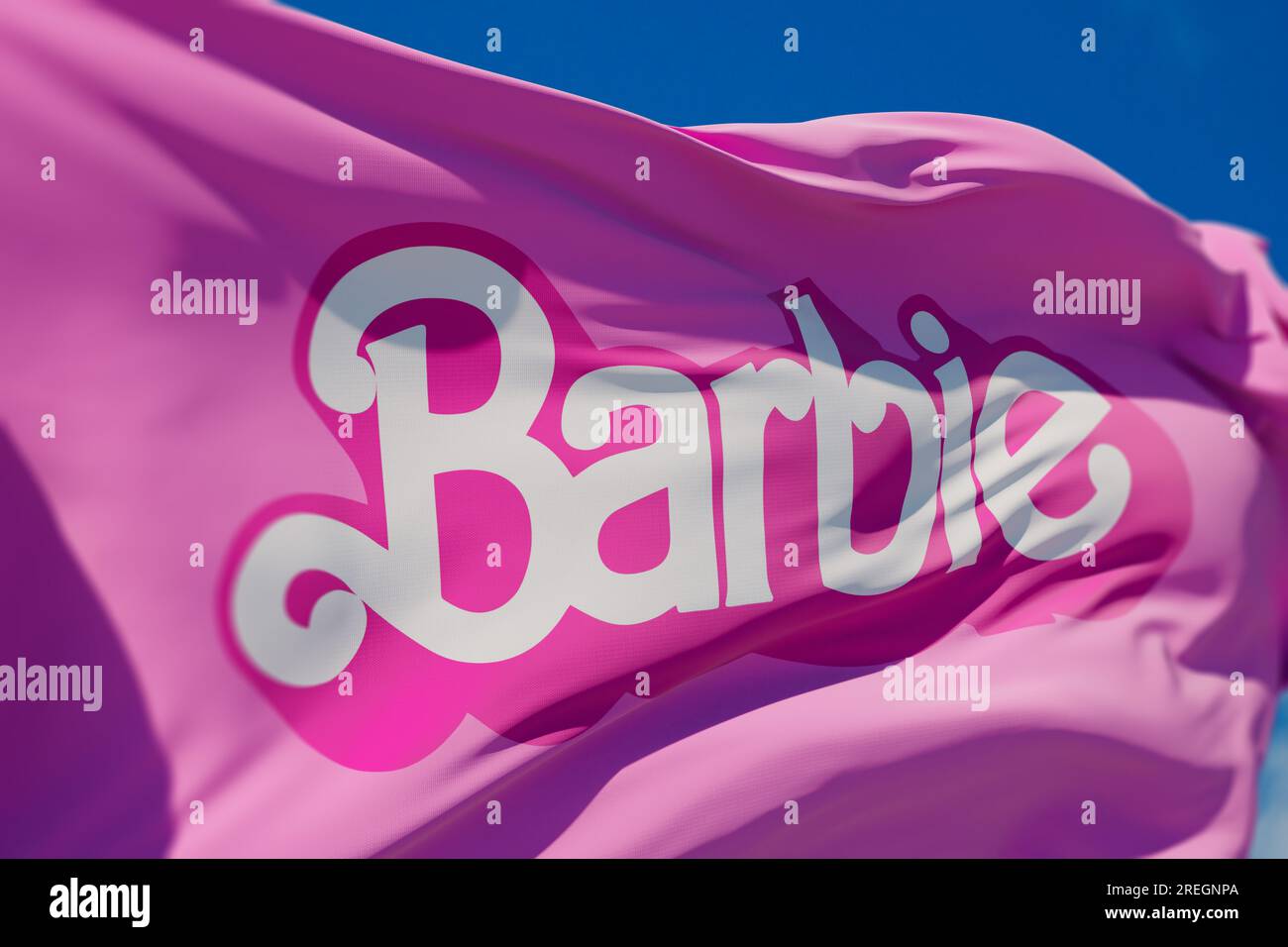 LONDON, UK - July 2023: Barbie doll logo on a flag. Barbie is a fashion ...