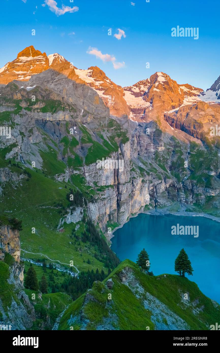 Aerial view of the sunset on the Oeschinensee. Kandersteg, Bernese ...