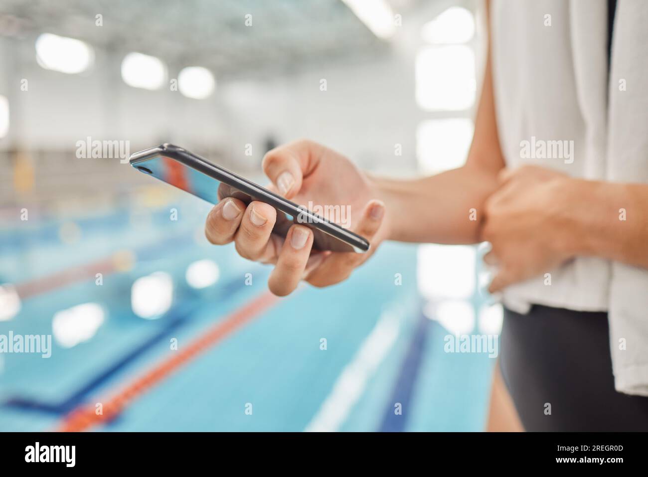Phone, hands and athlete at swimming pool with social media, scrolling ...