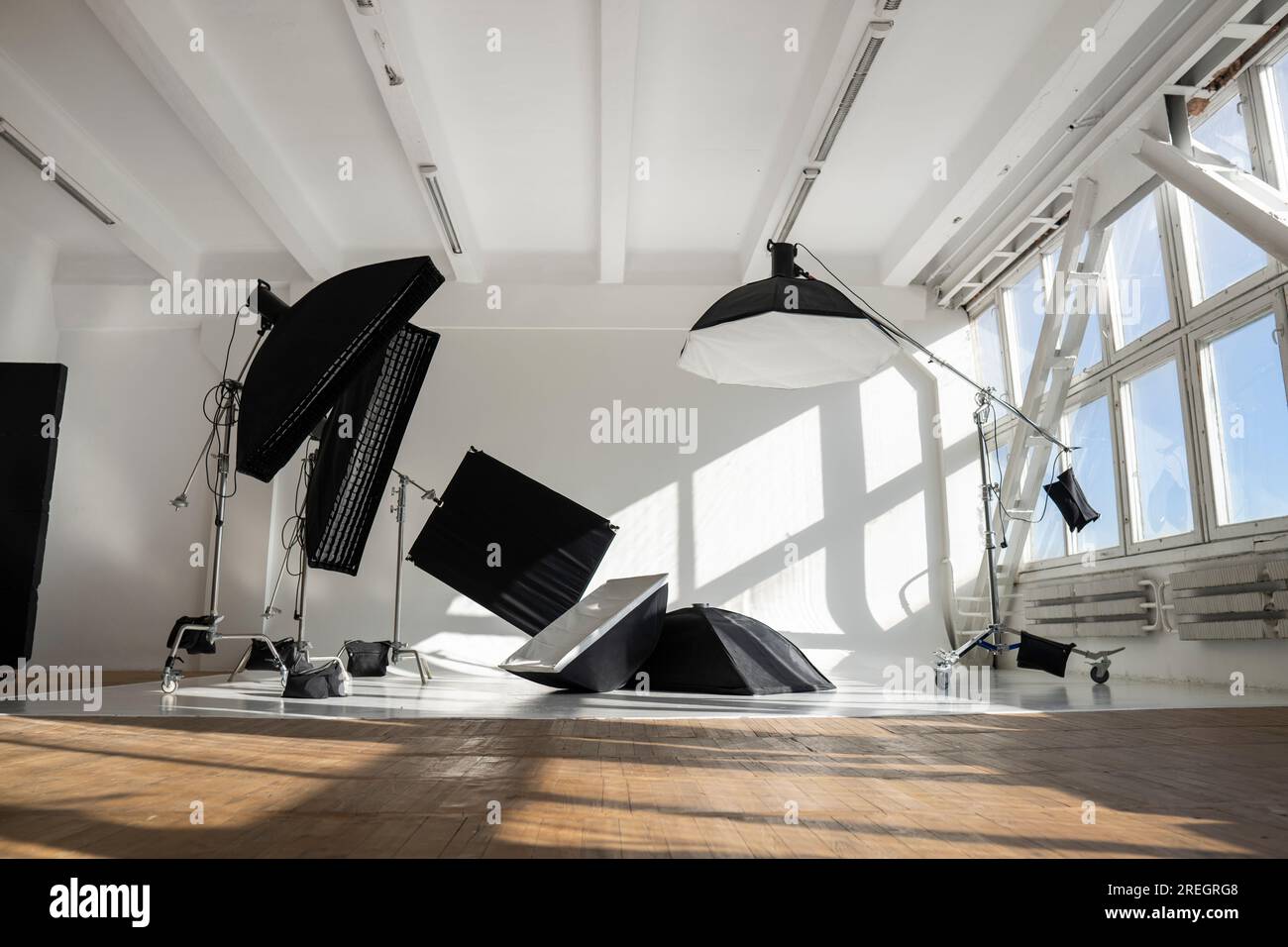 White cyclorama in professional photostudio. Professional equipment ...