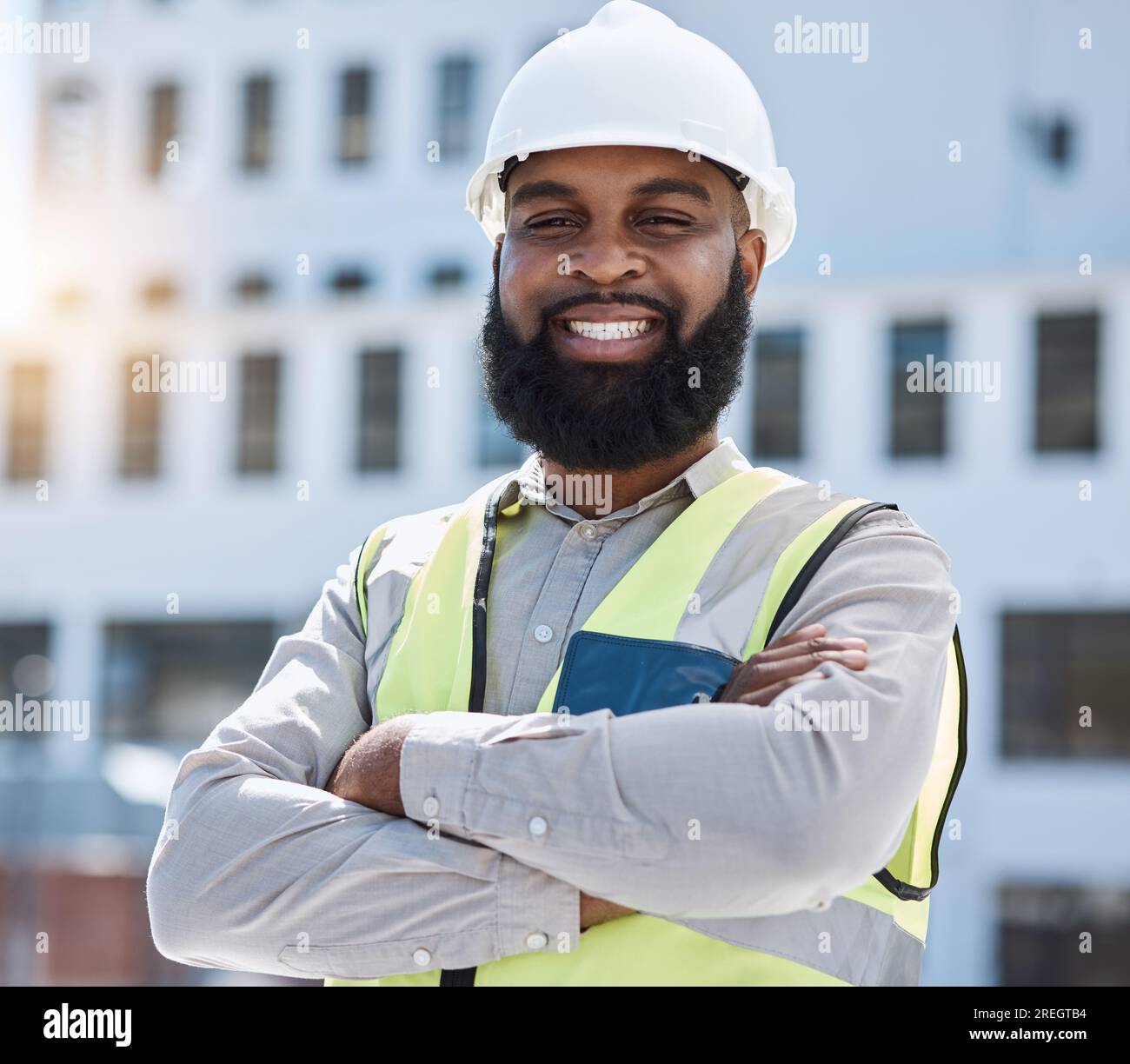 Construction, portrait or man with arms crossed in city for building ...