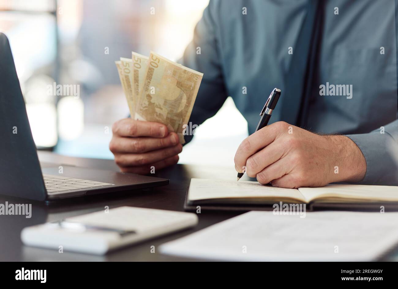 Balance money staff hi-res stock photography and images - Alamy