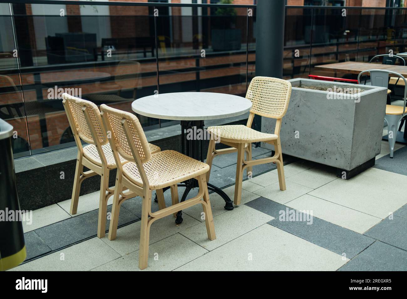 Cafe interior design. Interior design style, wooden tables and chairs ...