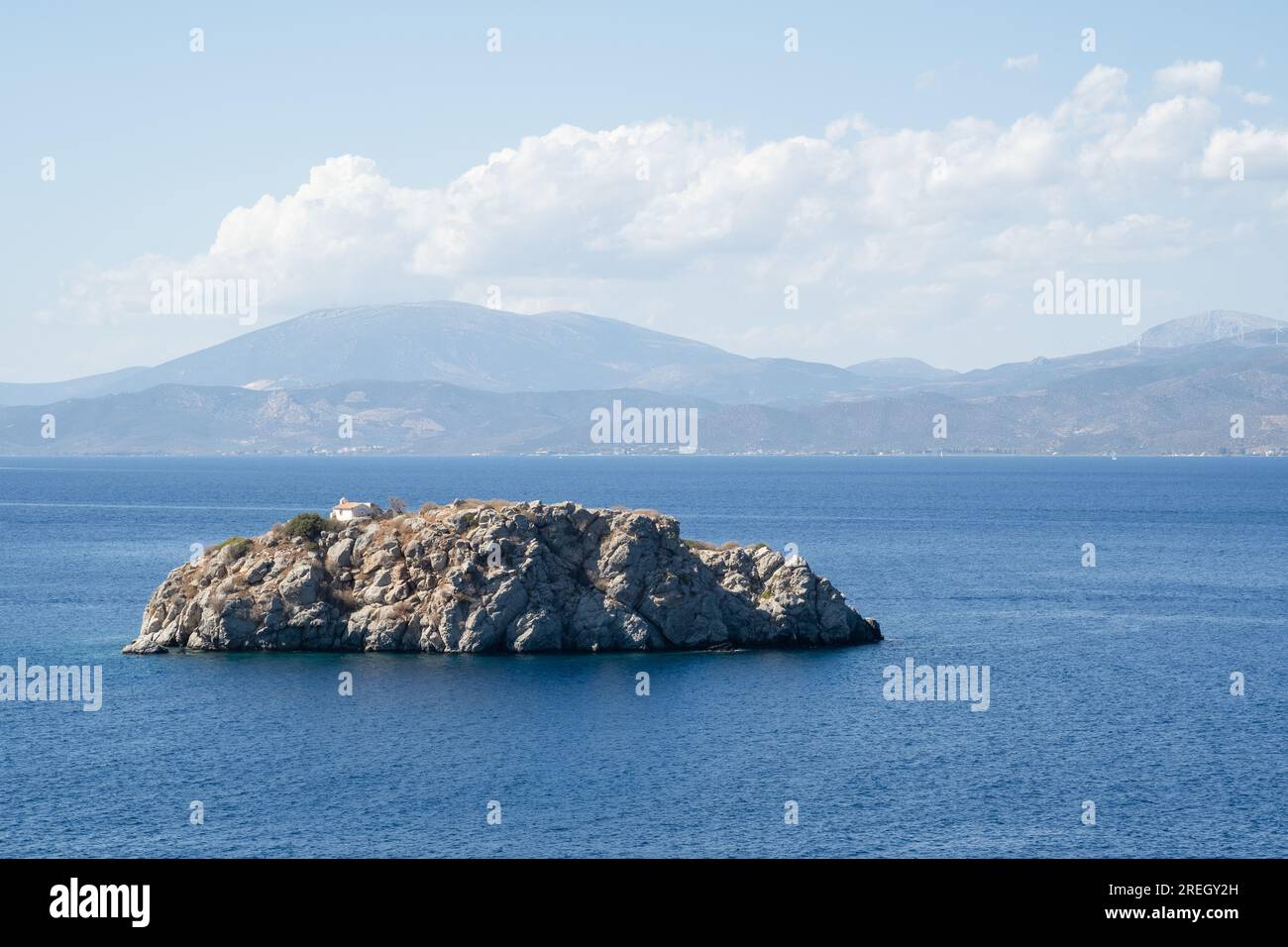 Tiny island with a church on it, off the coast of Hydra, Greece Stock ...