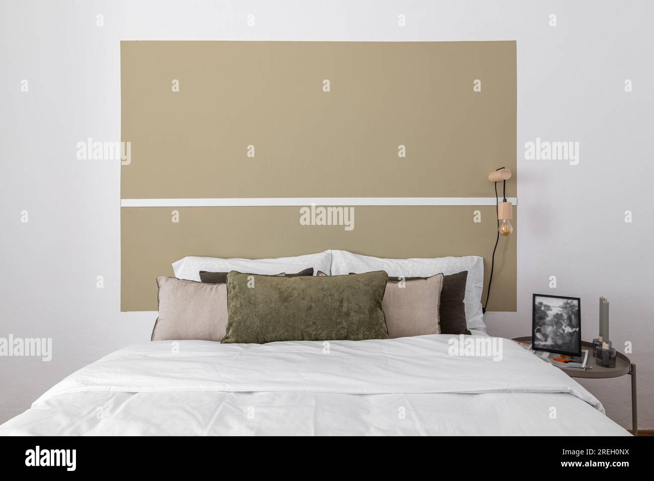 Cozy bedroom interior with inviting bed and stylish furniture Stock ...