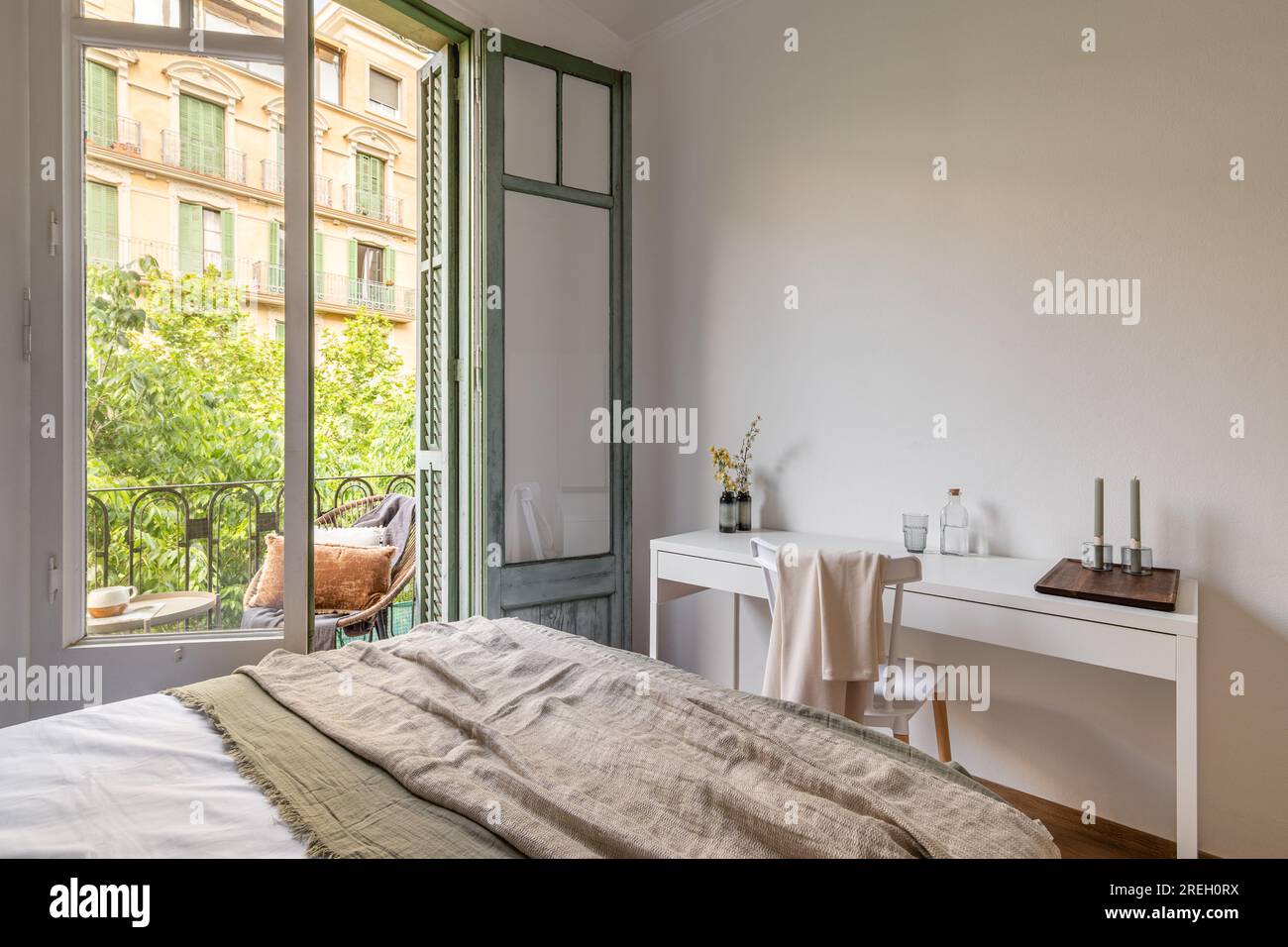 Bright and airy home interior with balcony views and sunny daylight ...