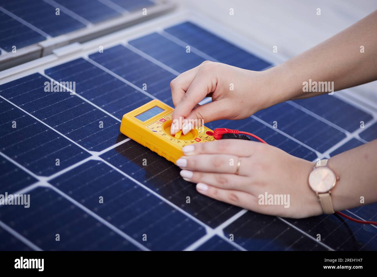 Solar panels, voltage meter and hands for renewable energy, electricity ...