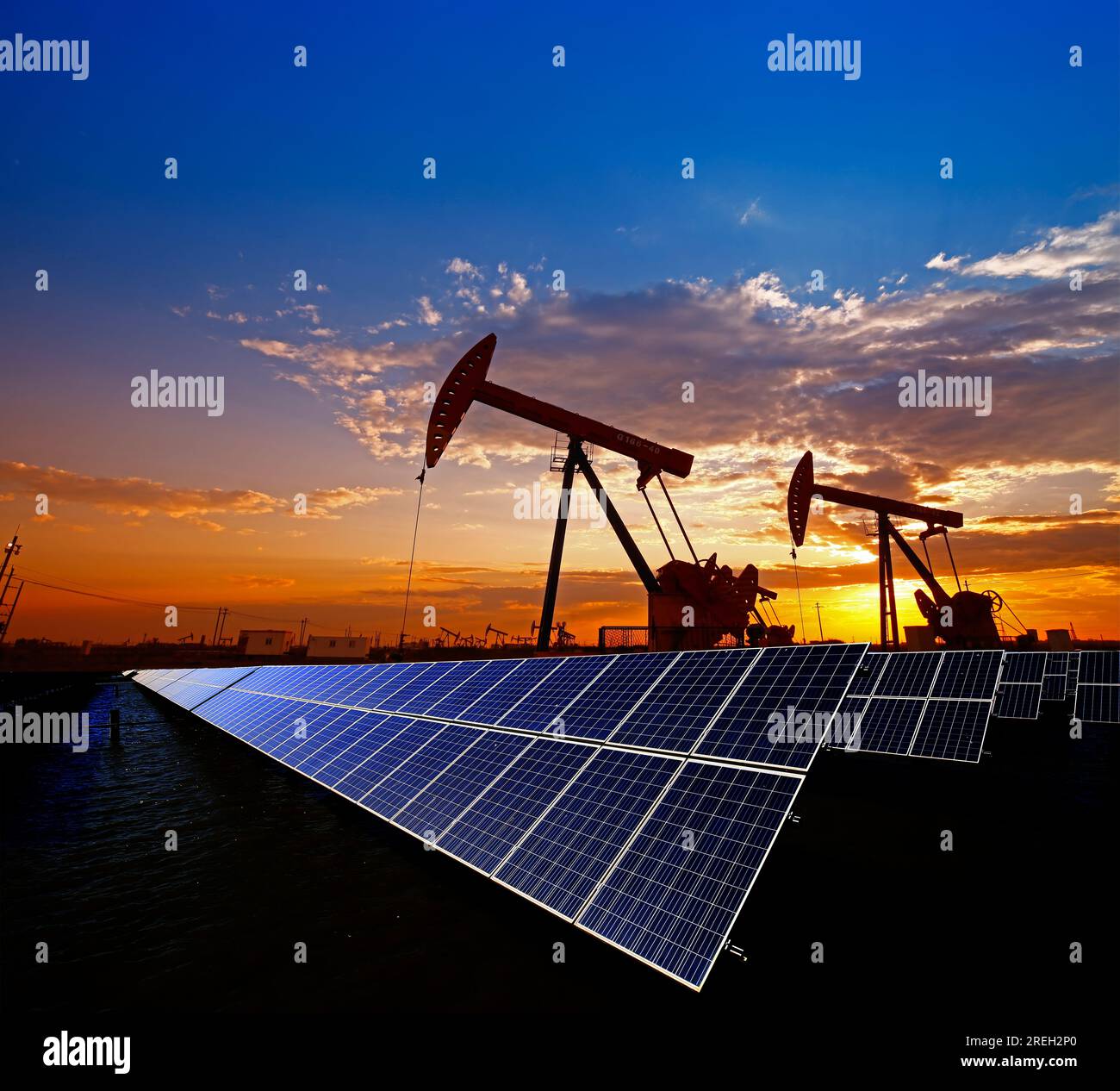 Oil pump with solar panels, industrial equipment Stock Photo - Alamy