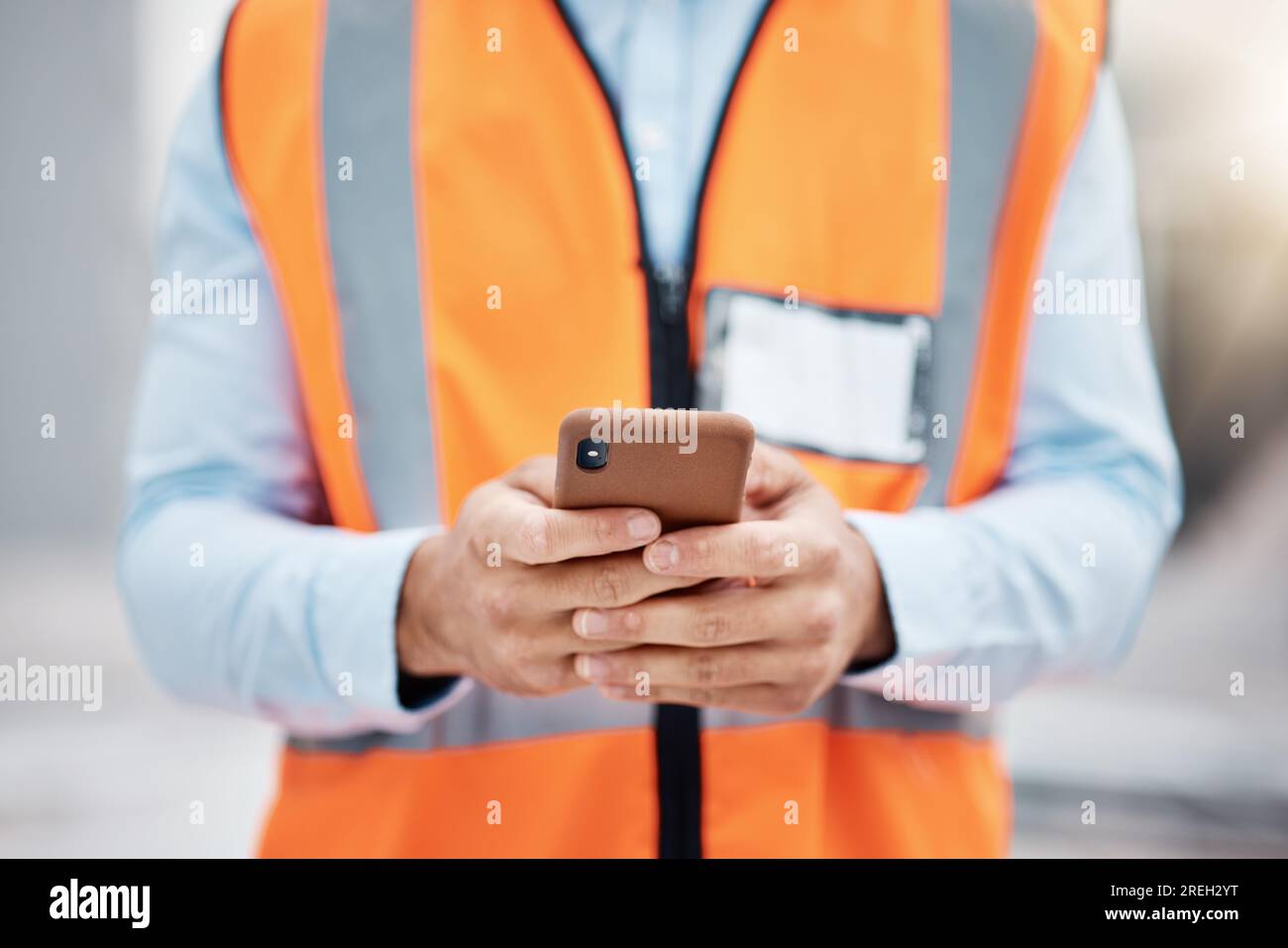 Phone, construction site and search with hands of person for ...