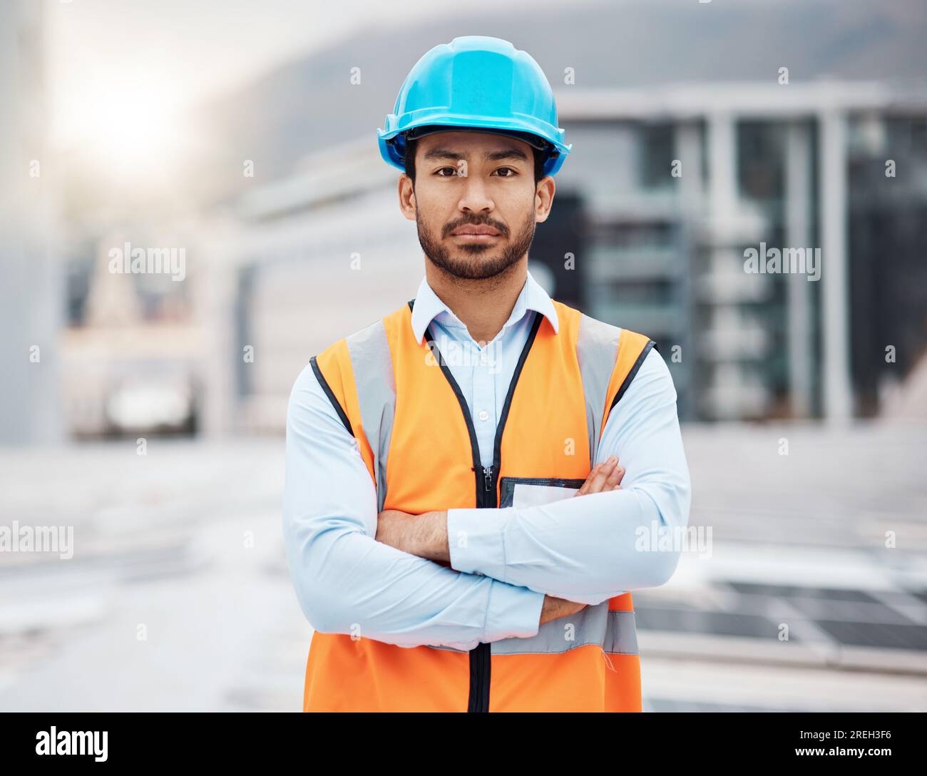 Portrait, construction worker and man with arms crossed with solar ...