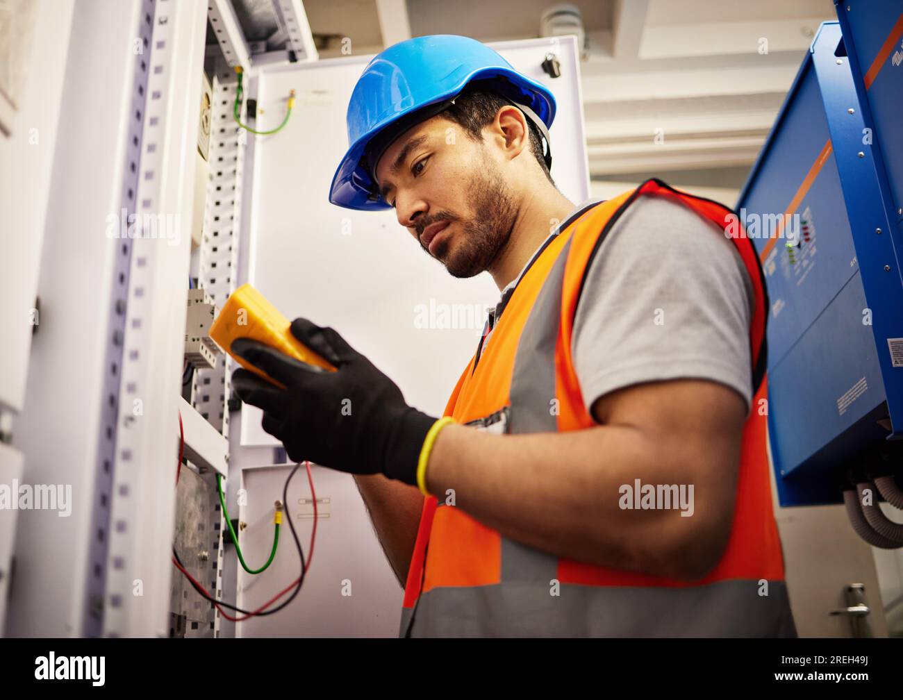 Electrician, energy and inspection with man in control room for ...