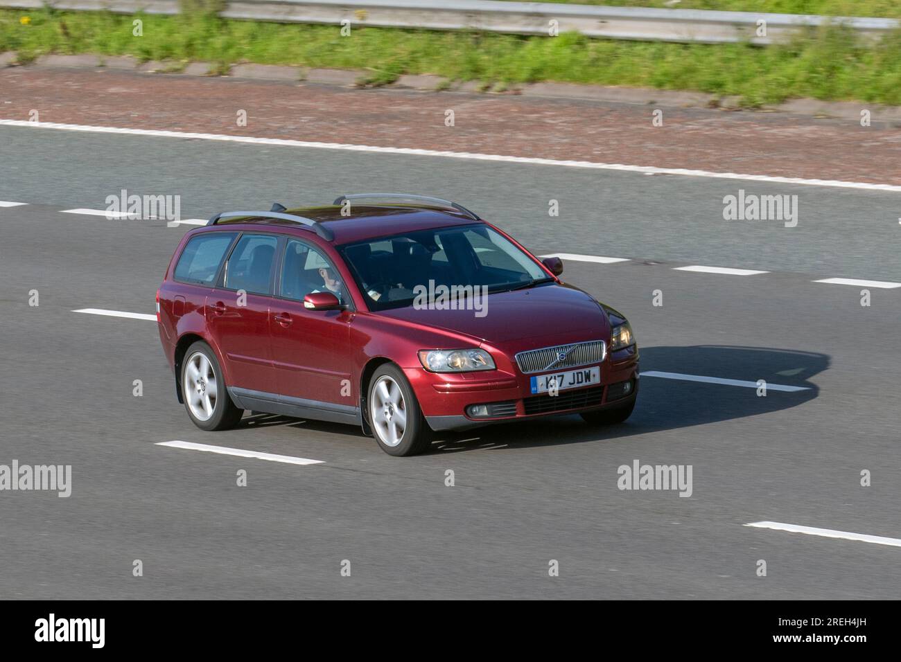 2006 Red Volvo V50 SE 1998cc, 4-door, 5-passenger wagon; travelling at ...