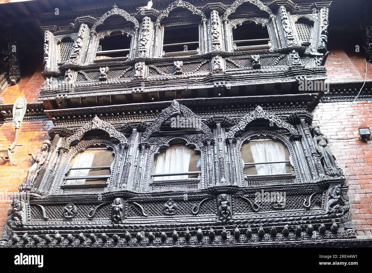 Peeping window from rooms to the central courtyard with detailed Wood ...